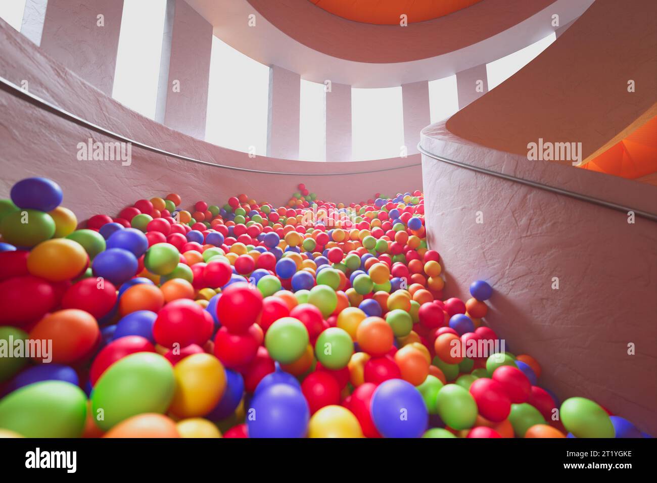 Countless vibrant balls fall down a tall spiral staircase in a ...