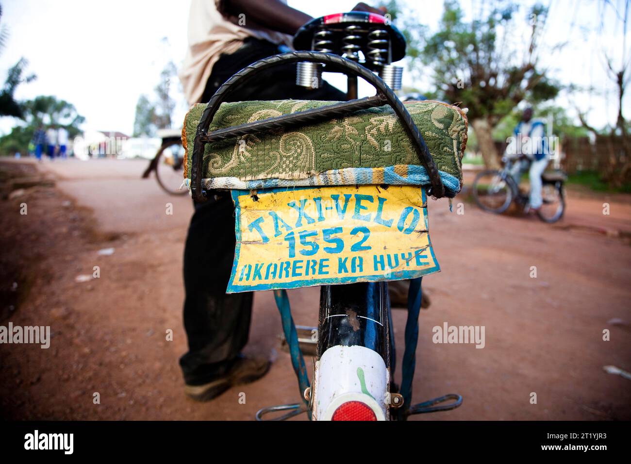 A taxi sign on the back of a bike in the city of Butare, Rwanda Stock ...