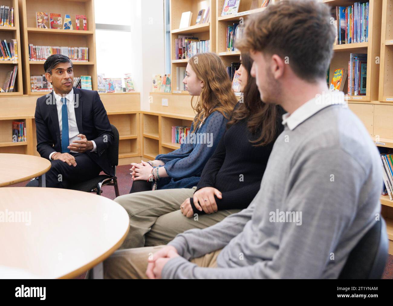 Prime Minister Rishi Sunak talking to 6th form students during a visit ...