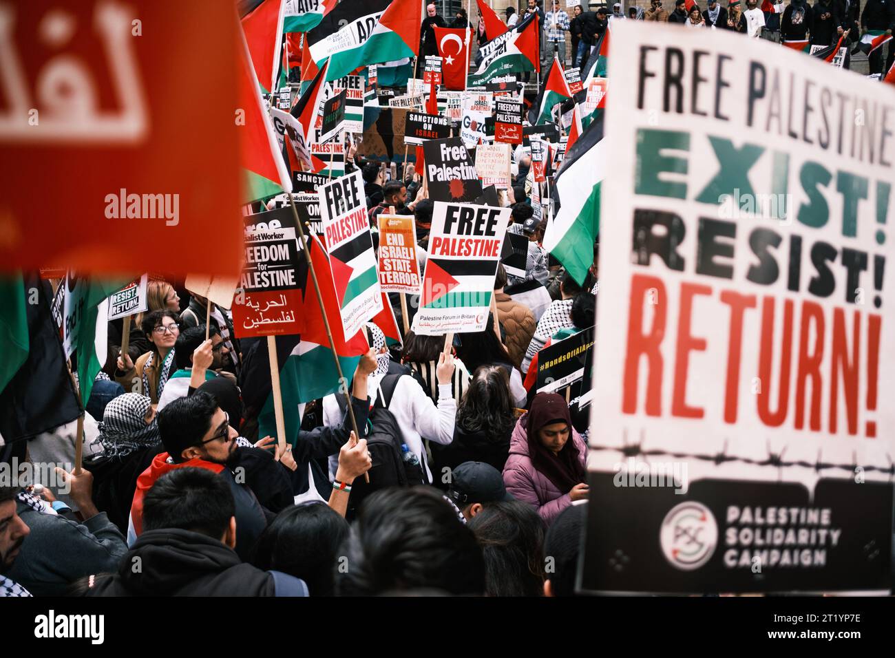 London, UK. 14th October, 2023. Thousands of people attend a pro-Palestine march outside the BBC ...
