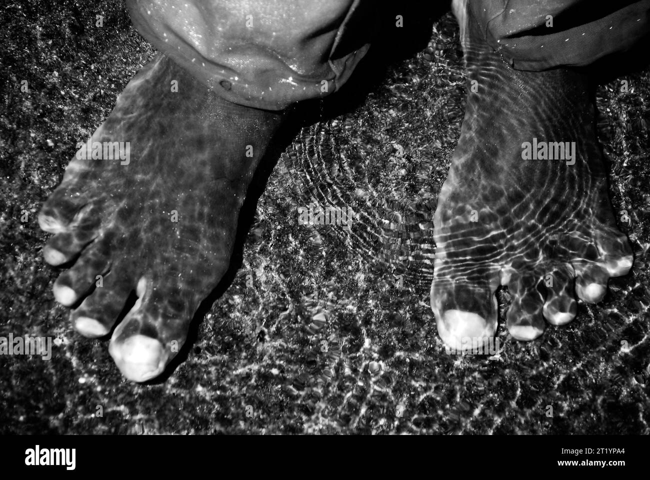 Feet under water Stock Photo - Alamy