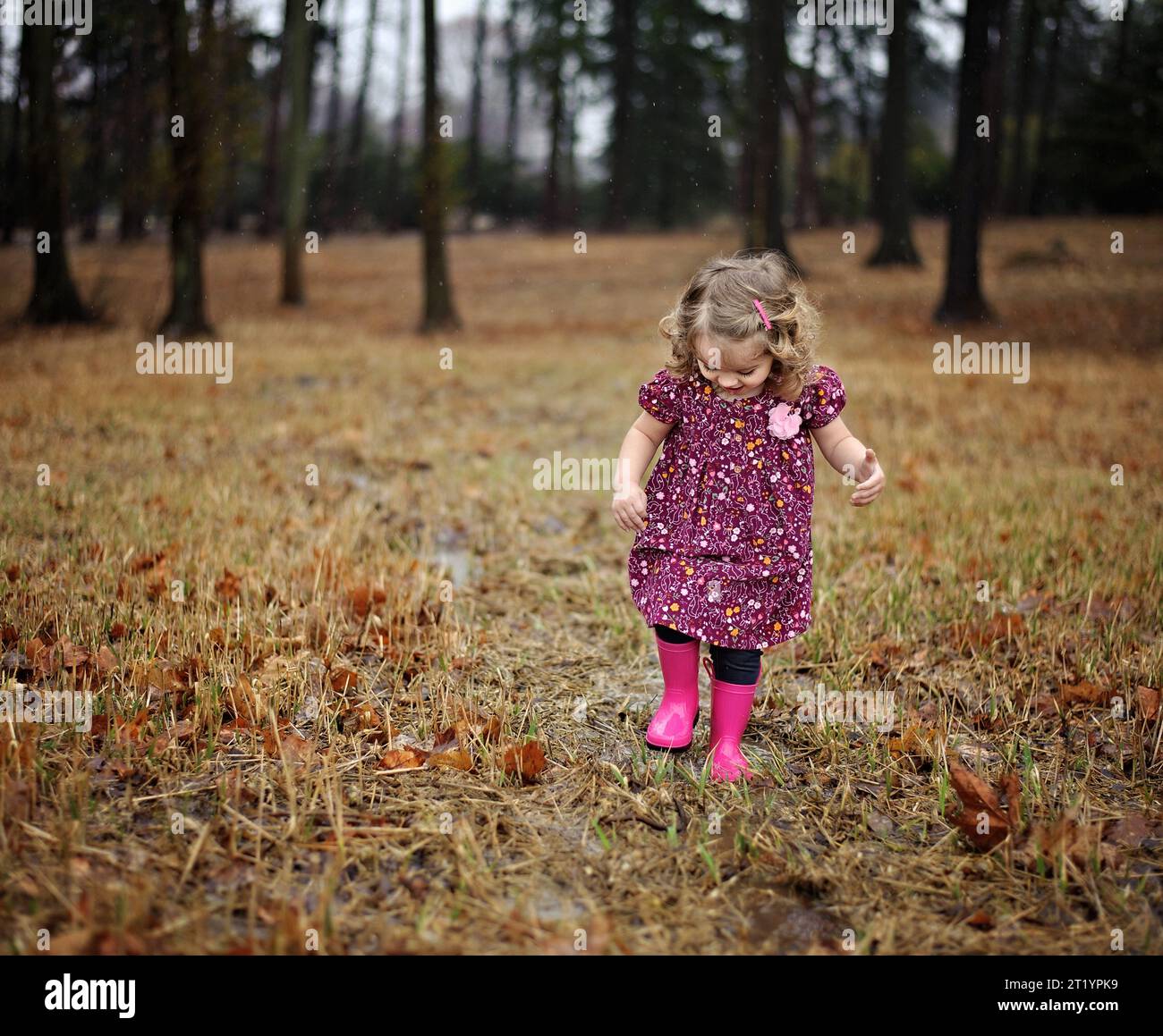 Child walking through mud hi-res stock photography and images - Alamy