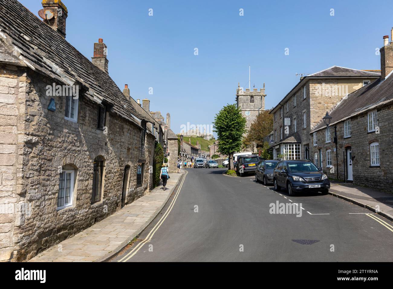 Corfe Castle village in Dorset blue sky sunny autumn day shops and ...