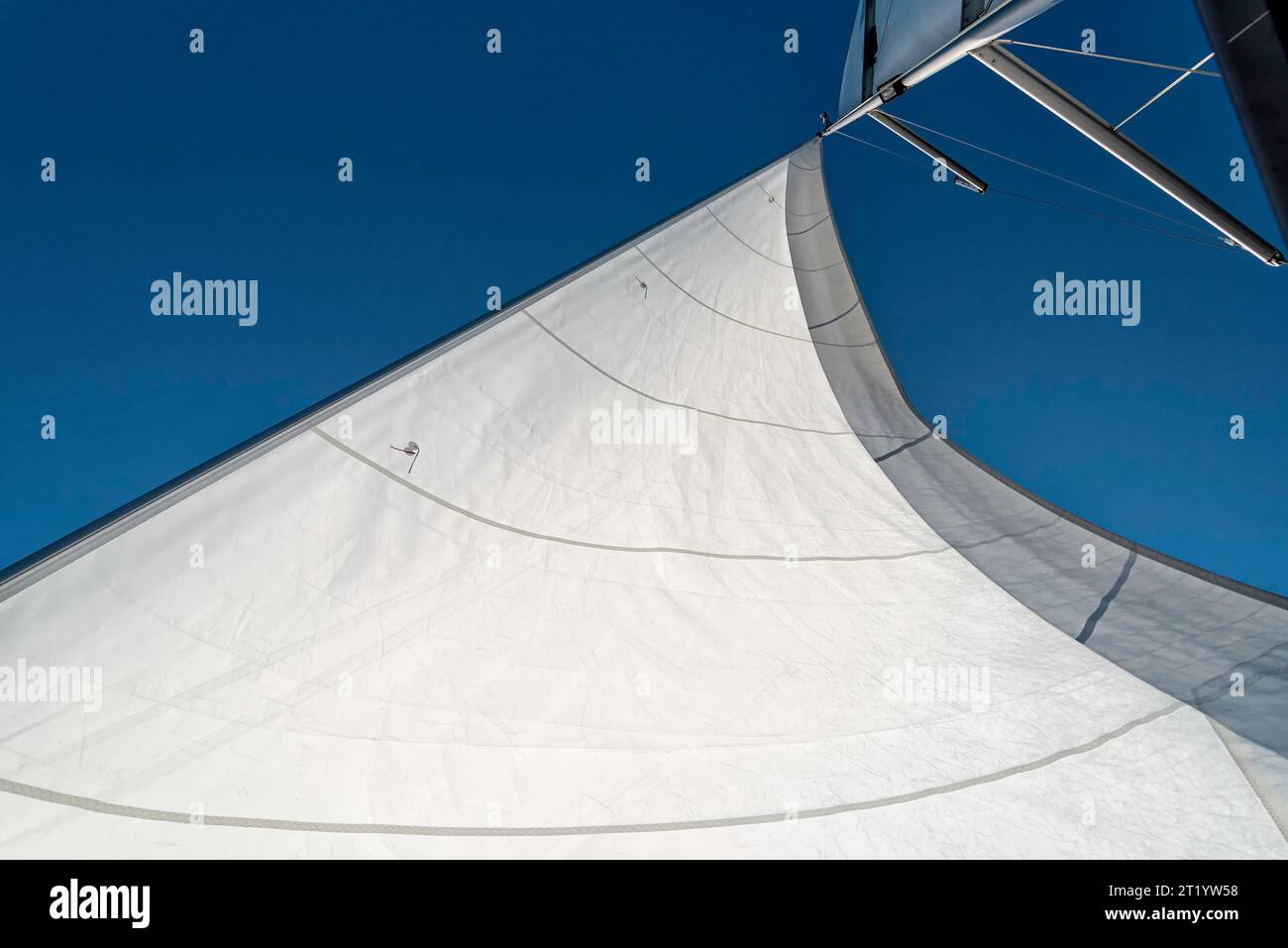 sails of a sailing yacht in the wind sailing on the ocean Stock Photo ...
