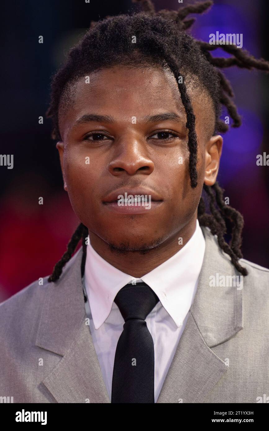 Rasaq Kukoyi poses for photographers upon arrival for the premiere of ...