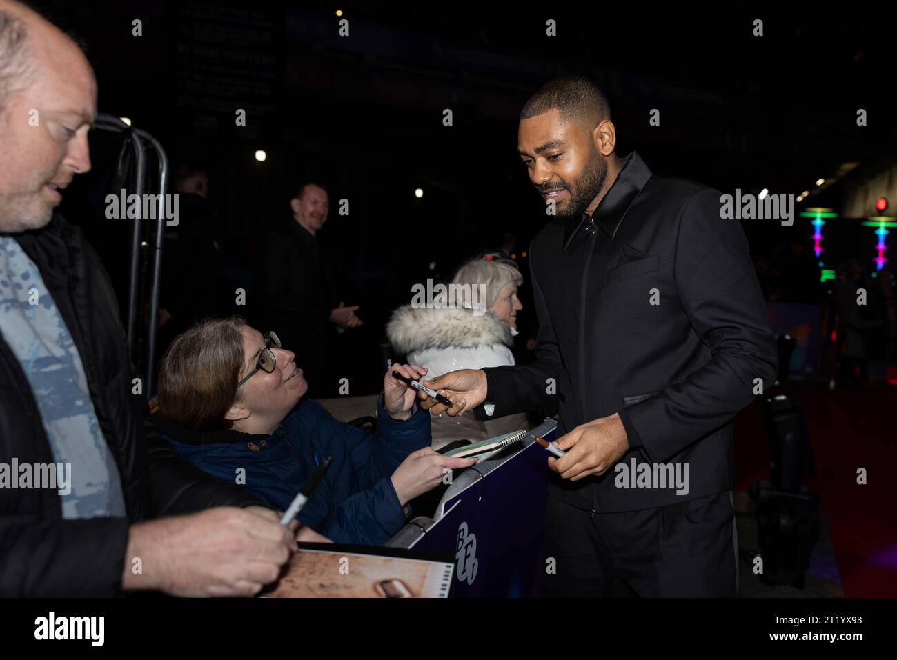Kano poses for photographers at the premiere of the film 'The Kitchen ...