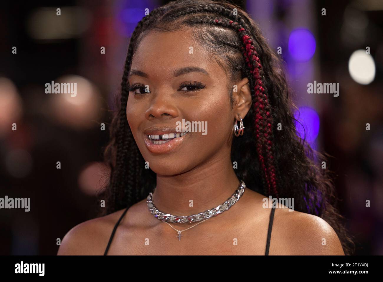 Cristale poses for photographers upon arrival for the premiere of the ...