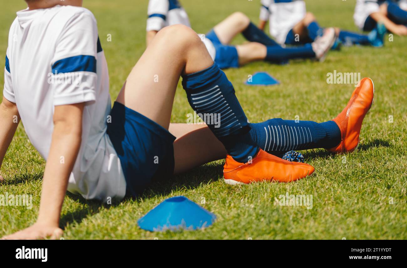 Group of Young Boys on Stretching Outdoor Session with Foam Rollers ...