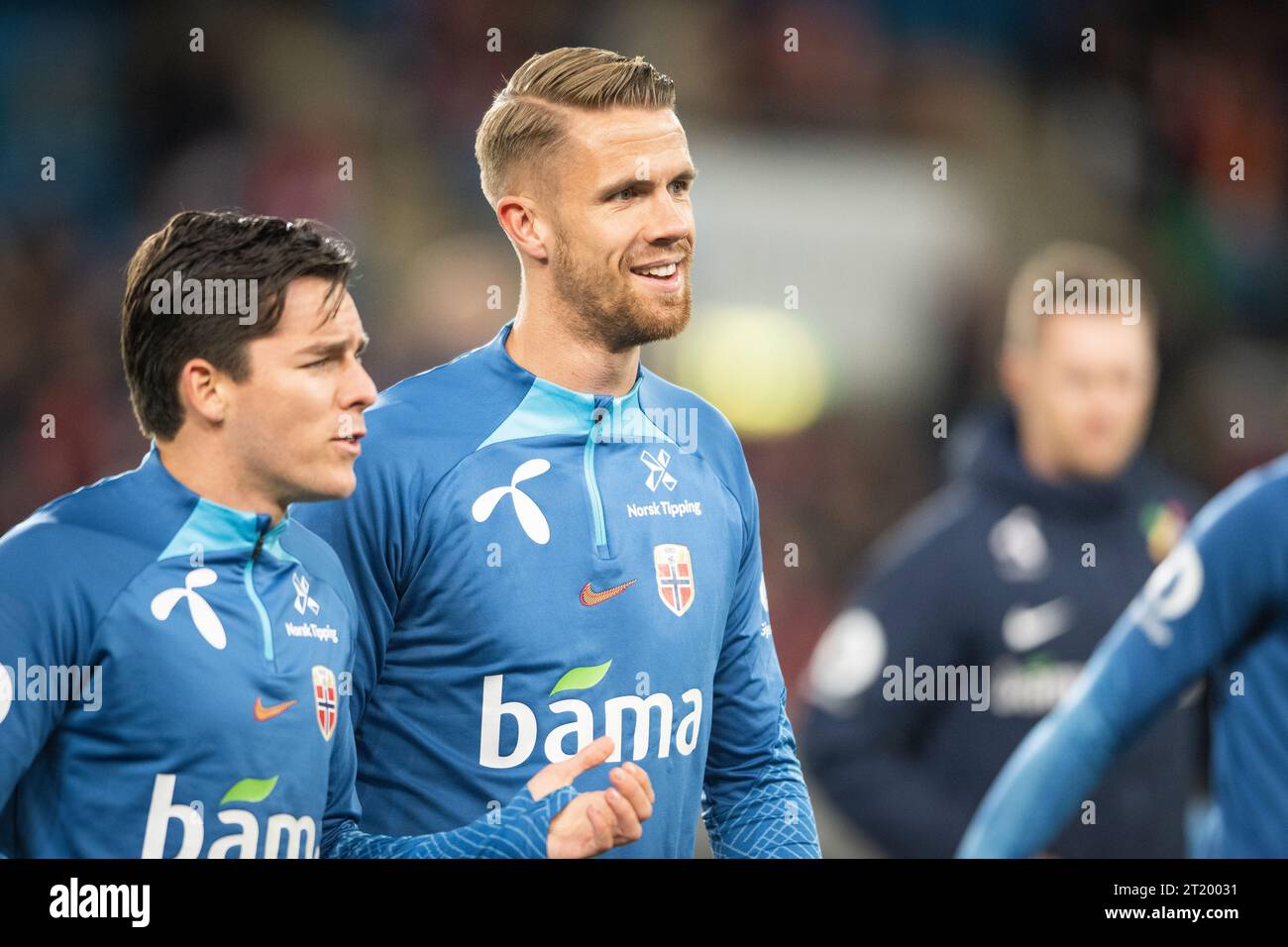 Oslo, Norway. 15th Oct, 2023. Kristoffer Ajer of Norway is warming up ...