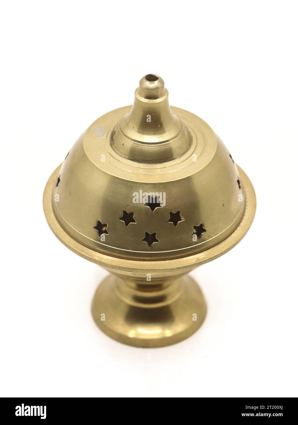 a divine incense holder diya lamp of unique shape made of golden brass ...