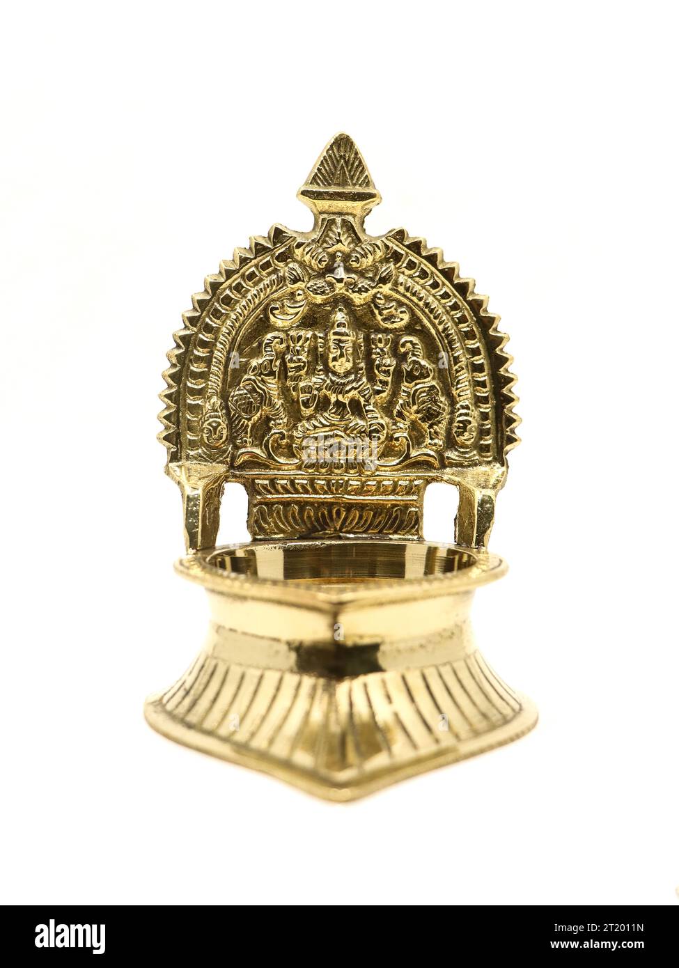 an antique brass kamatchi diya oil lamp with a hindu god carving used ...