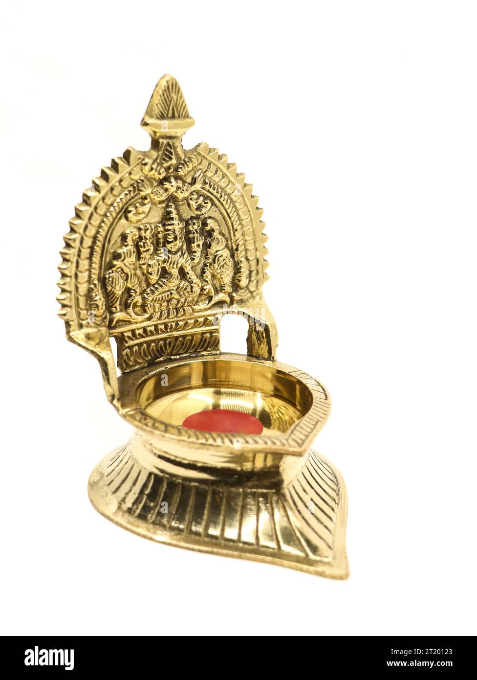 an antique brass kamatchi diya oil lamp with a hindu god carving used ...