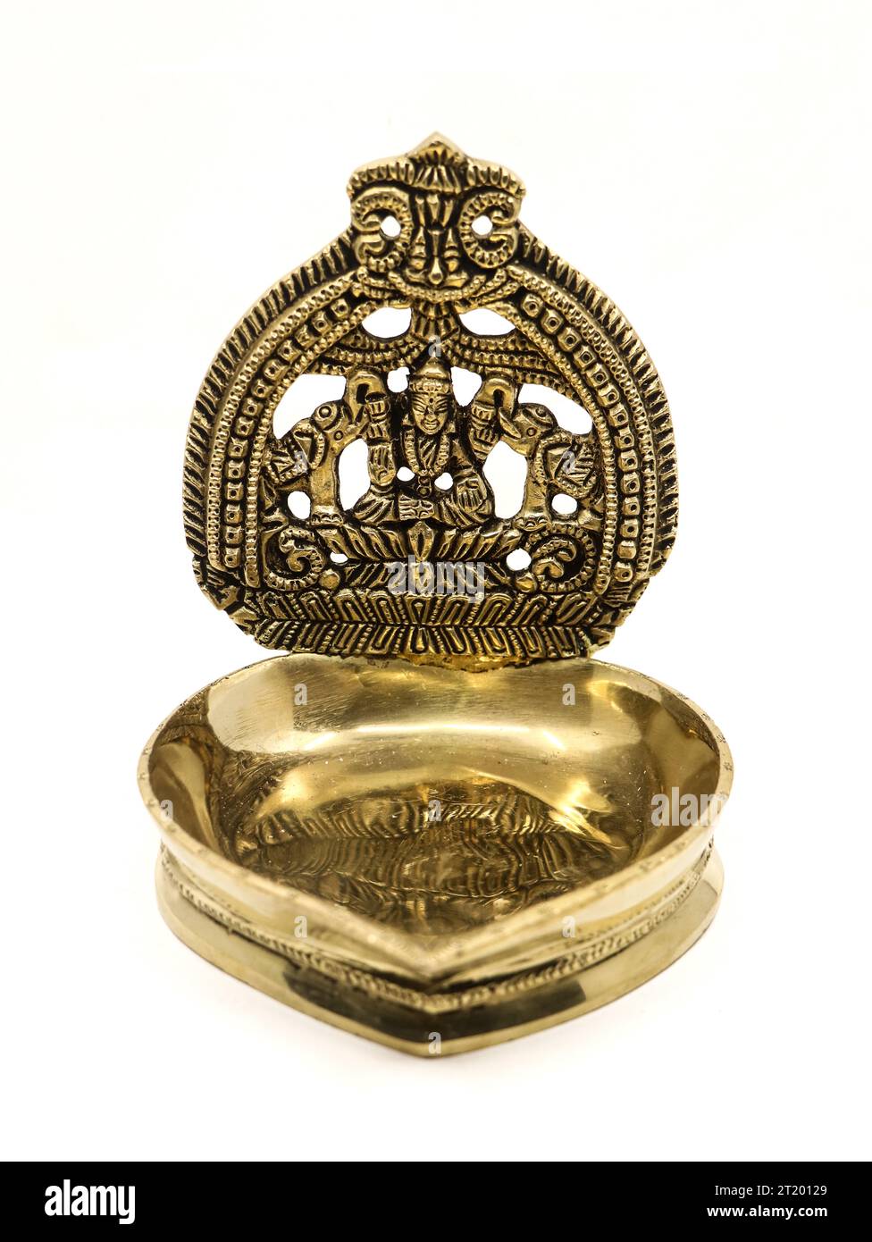an antique brass kamatchi diya oil lamp with a hindu god carving used ...