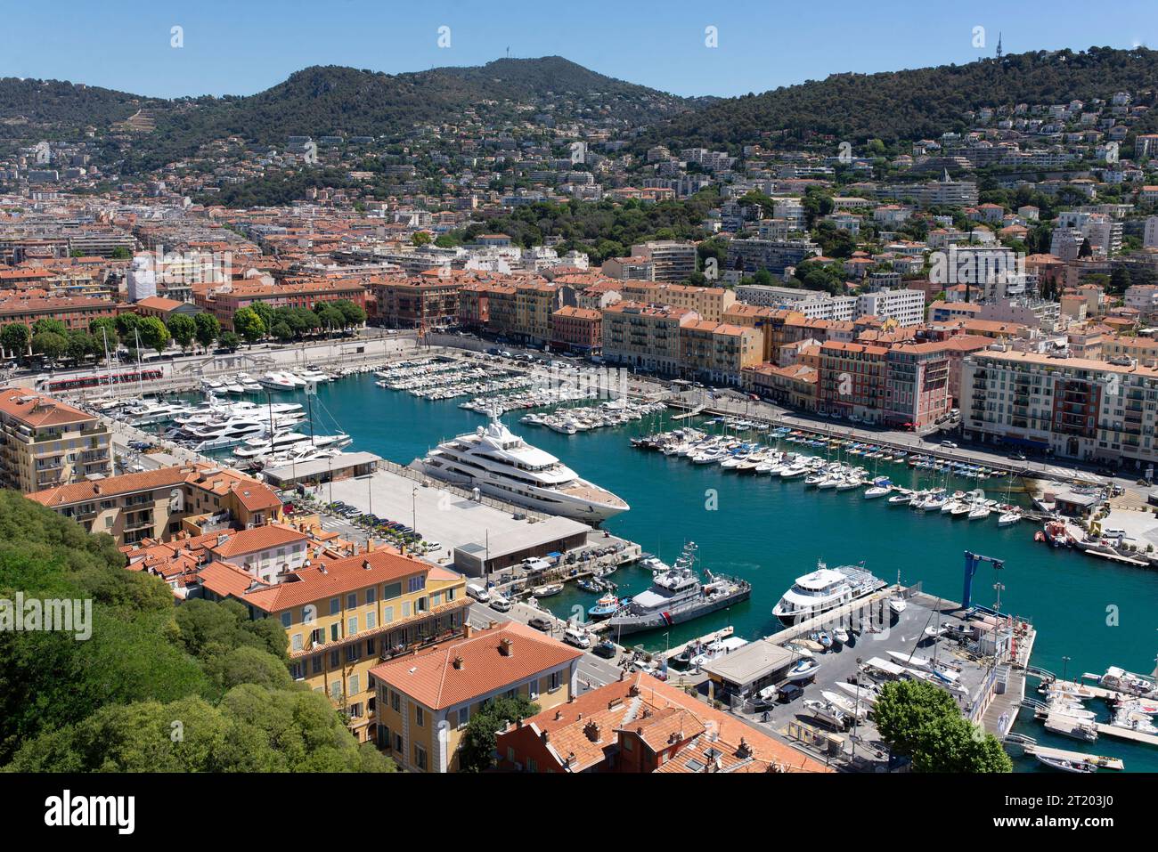 Overlooking the boats and buildings at Nice Harbour Stock Photo - Alamy