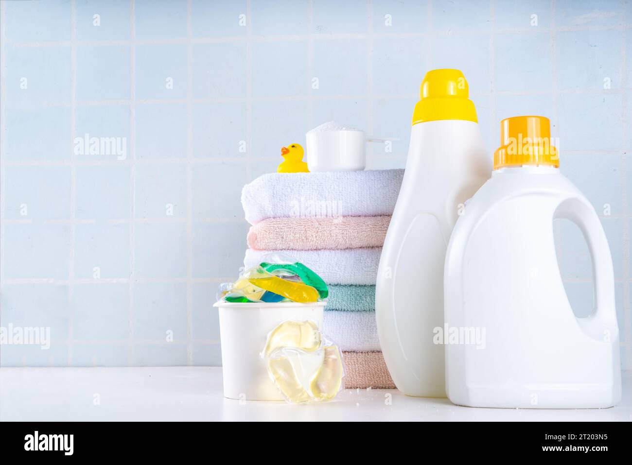 Laundry, washing and cleaning concept. Stack of clean towels, with ...
