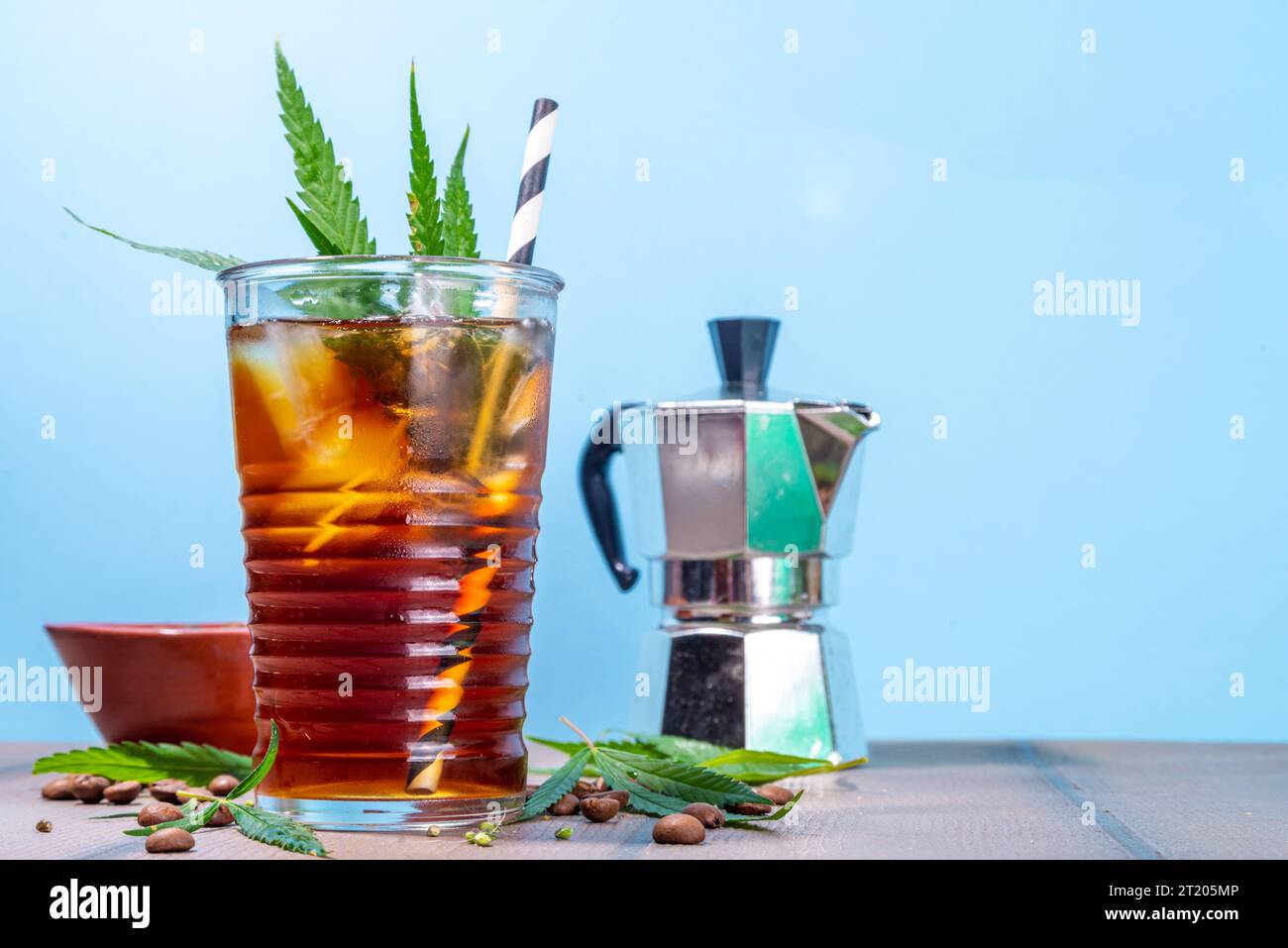 Medical cannabis hemp cold coffee drink. Glass of iced espresso coffee ...