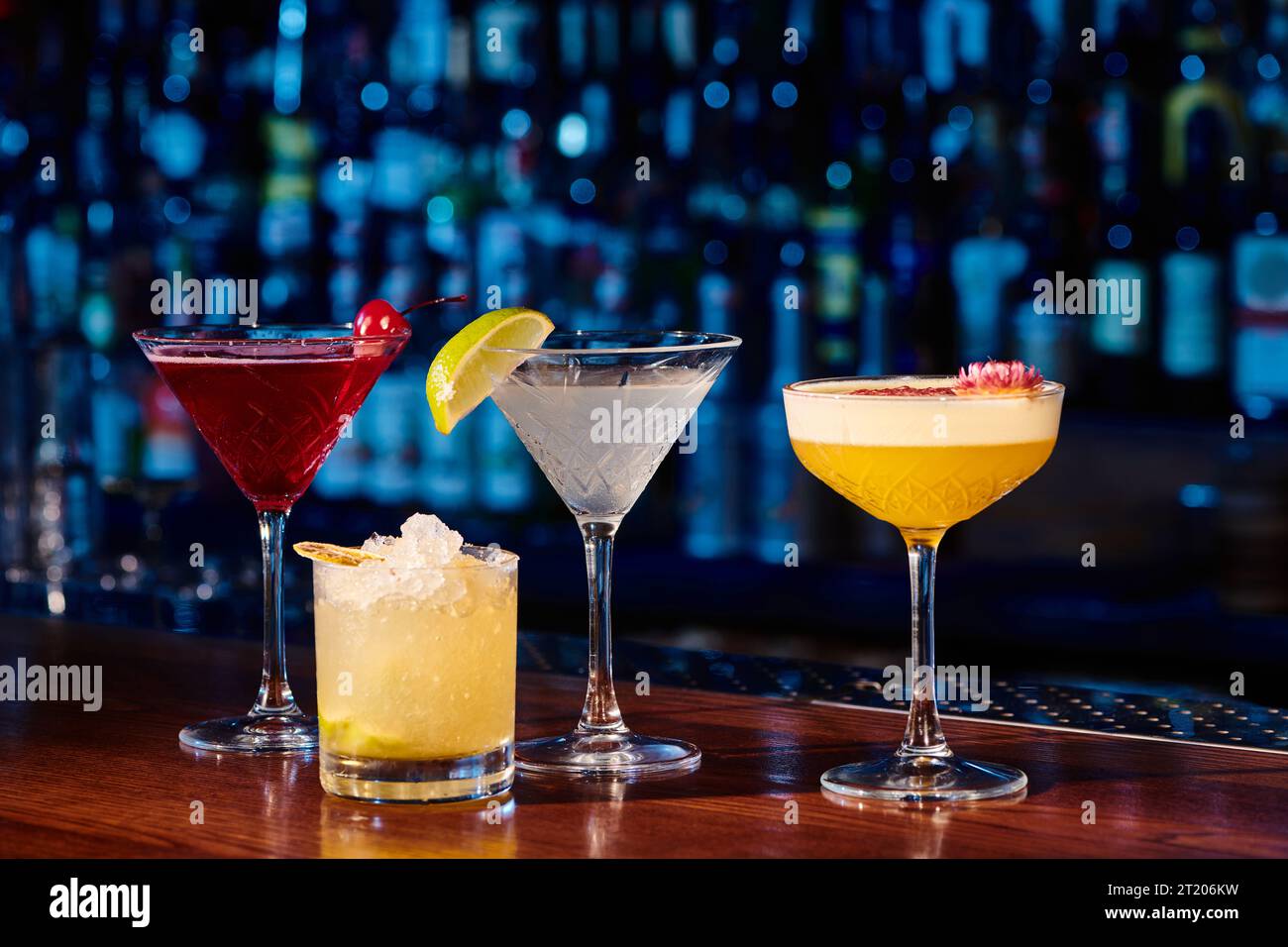 set of different cocktails with fresh plants and fruits decoration on ...