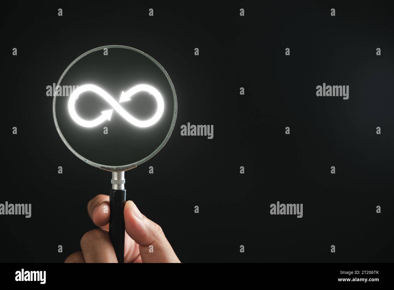 Magnifying glass highlights infinity symbol icons Stock Photo - Alamy Magnifying glass highlights infinity symbol icons Stock Photo - Alamy