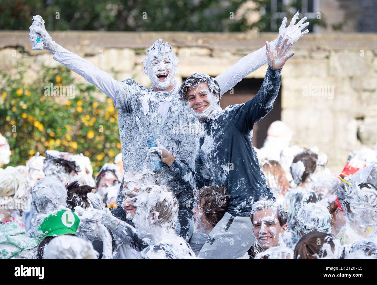 Students take part in the traditional Raisin Monday foam fight on St ...