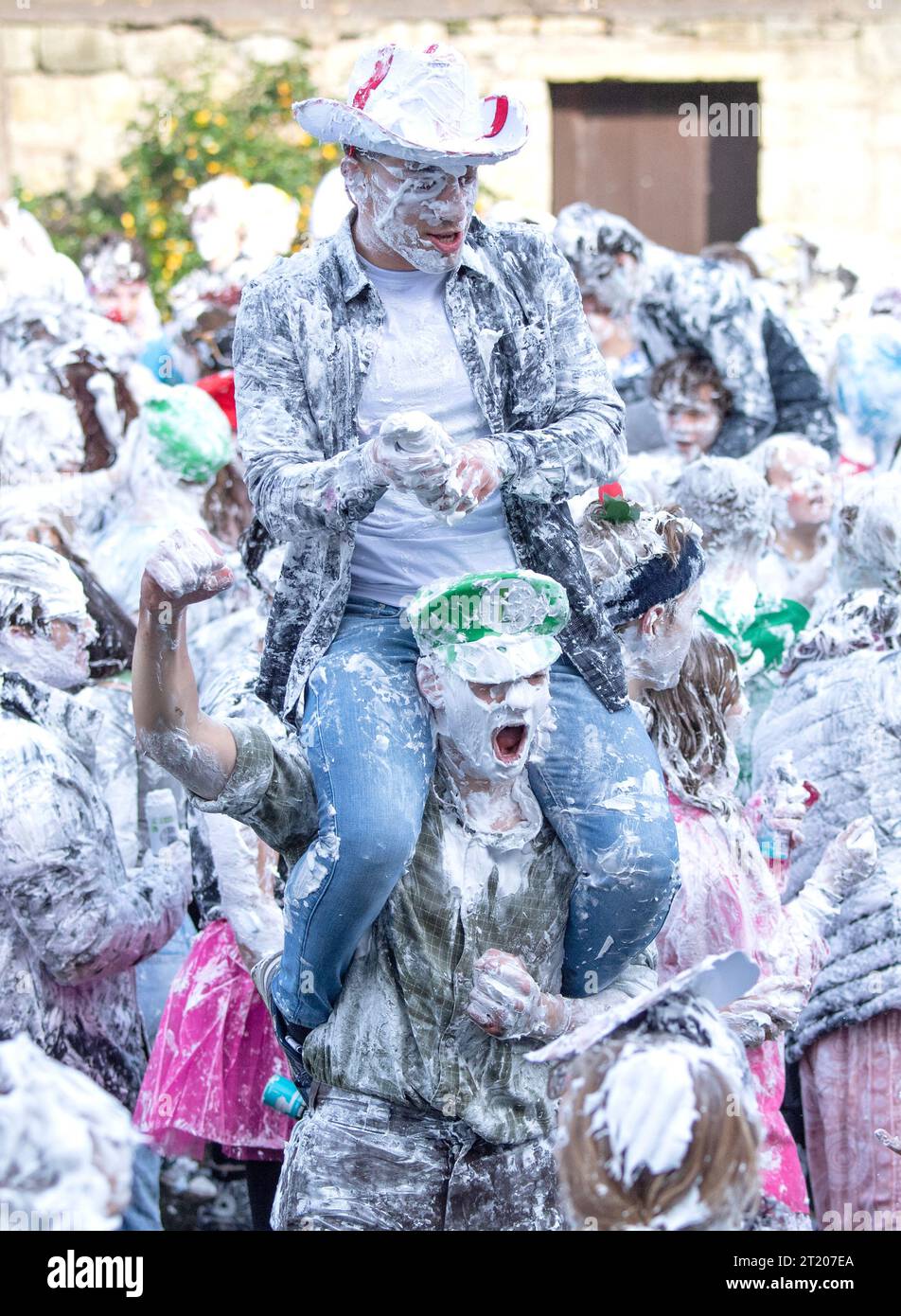 Students take part in the traditional Raisin Monday foam fight on St ...