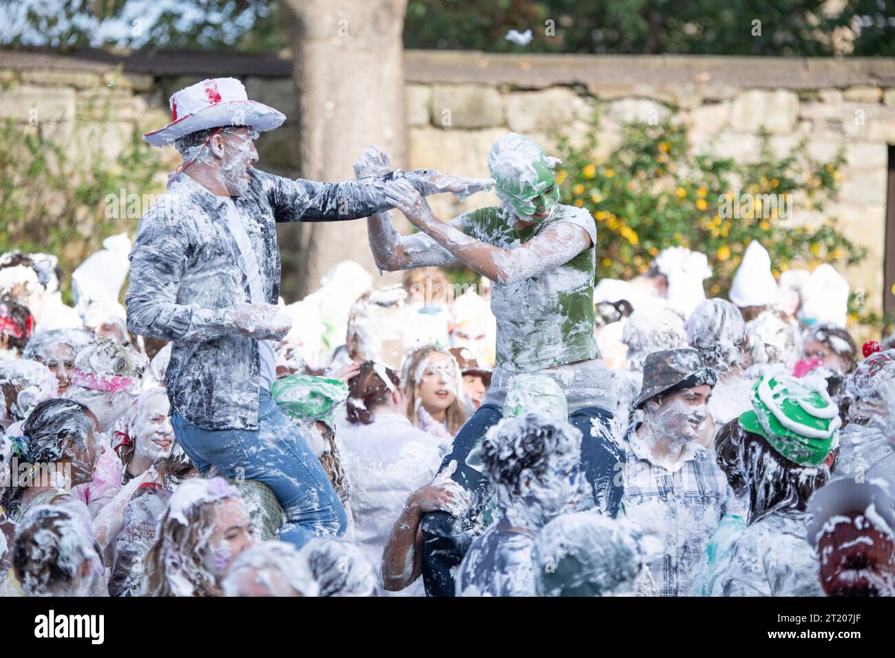 Students take part in the traditional Raisin Monday foam fight on St ...