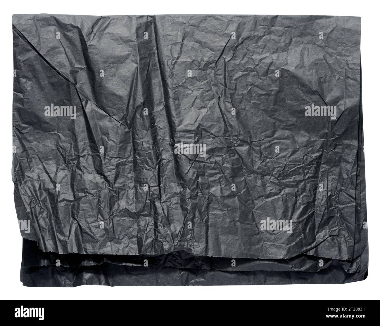 Folded sheet of crumpled black parchment paper on white isolated ...