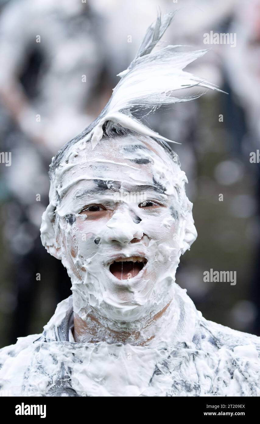Students take part in the traditional Raisin Monday foam fight on St ...