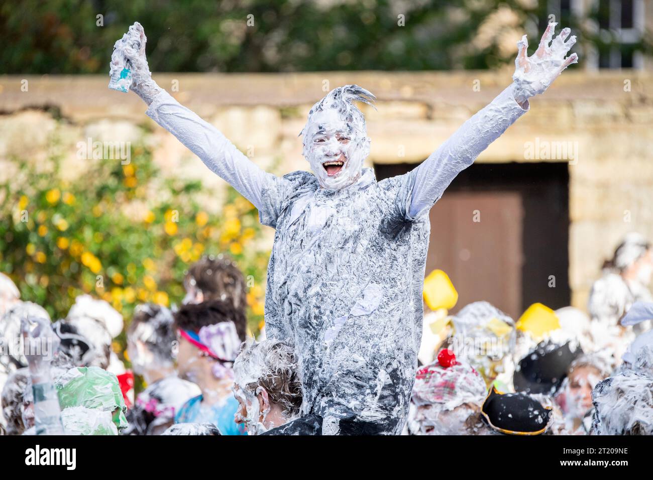 Students take part in the traditional Raisin Monday foam fight on St ...