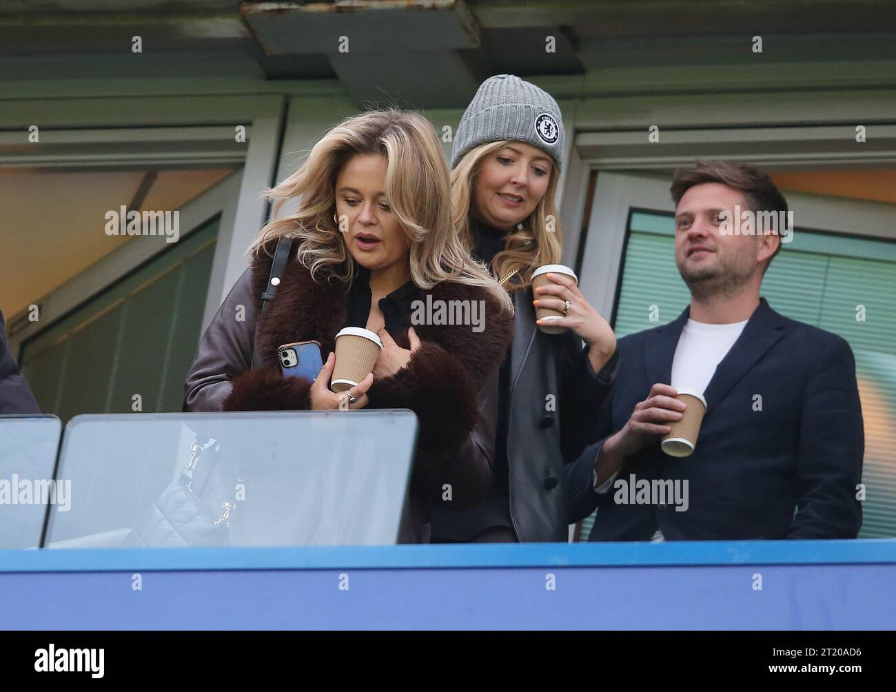 Actress Emily Atack watches on with her sister Martha Atack. - Chelsea ...