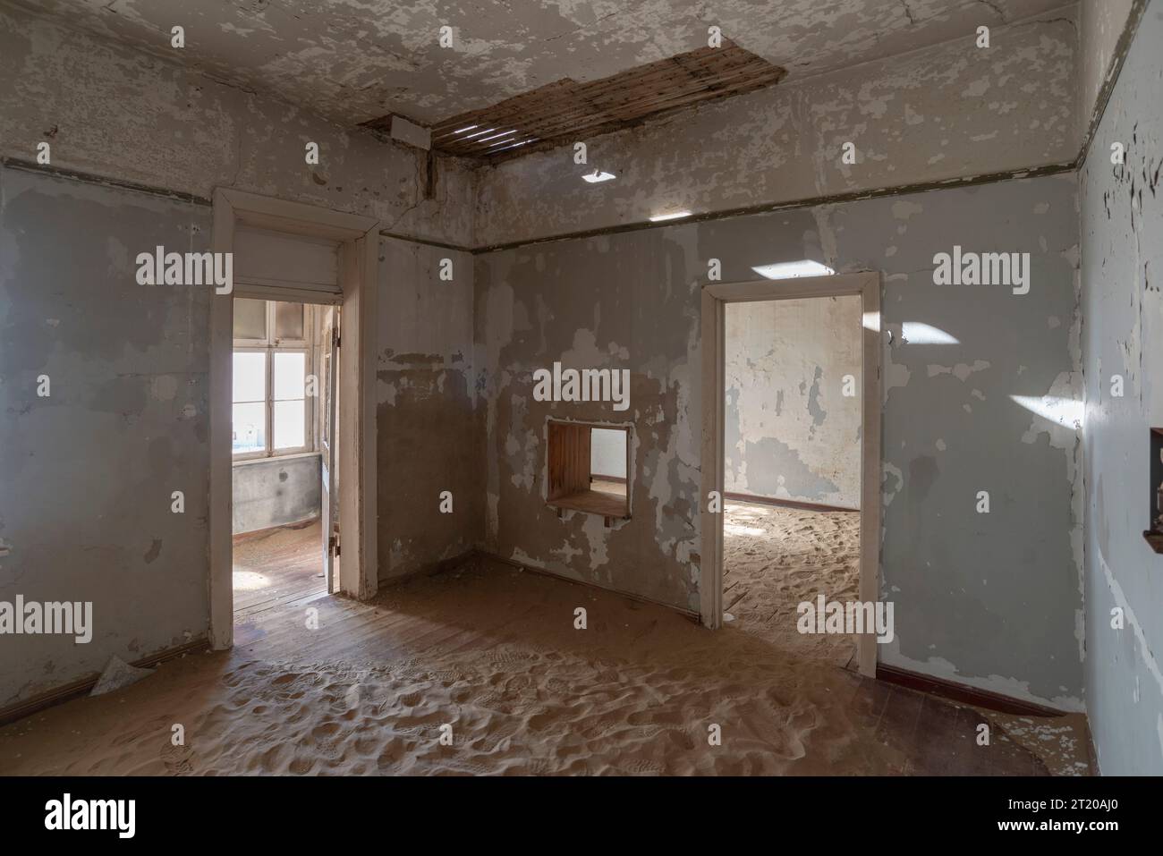 interior of abandoned building covered by sand in Kolmanskop town ...