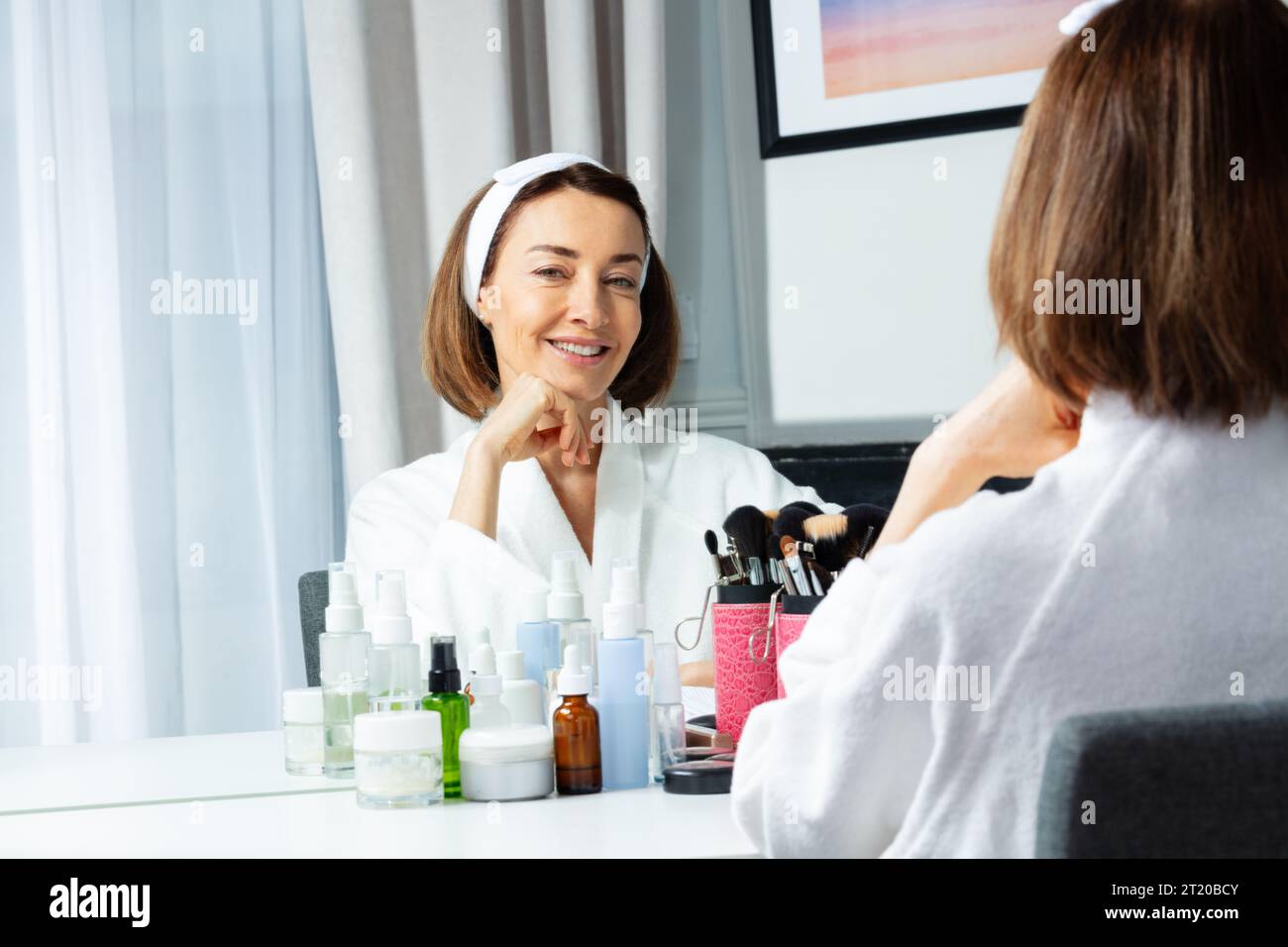 Woman glowing skin mirror hi-res stock photography and images - Alamy