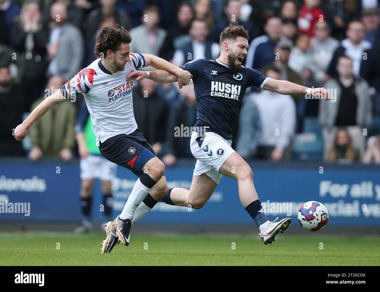 Tom Bradshaw of Millwall battles Tom Lockyer of Luton Town. - Millwall ...