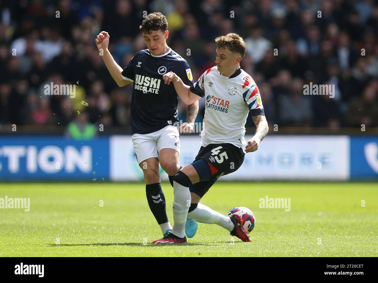 Dan McNamara of Millwall battles Alfie Doughty of Luton Town ...