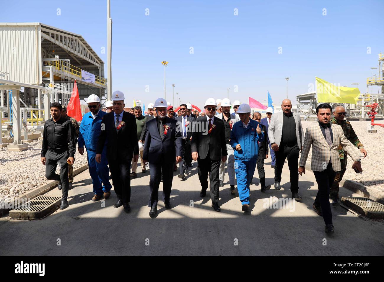 Baghdad, Iraq. 29th Sep, 2023. A Chinese employee introduces the ...