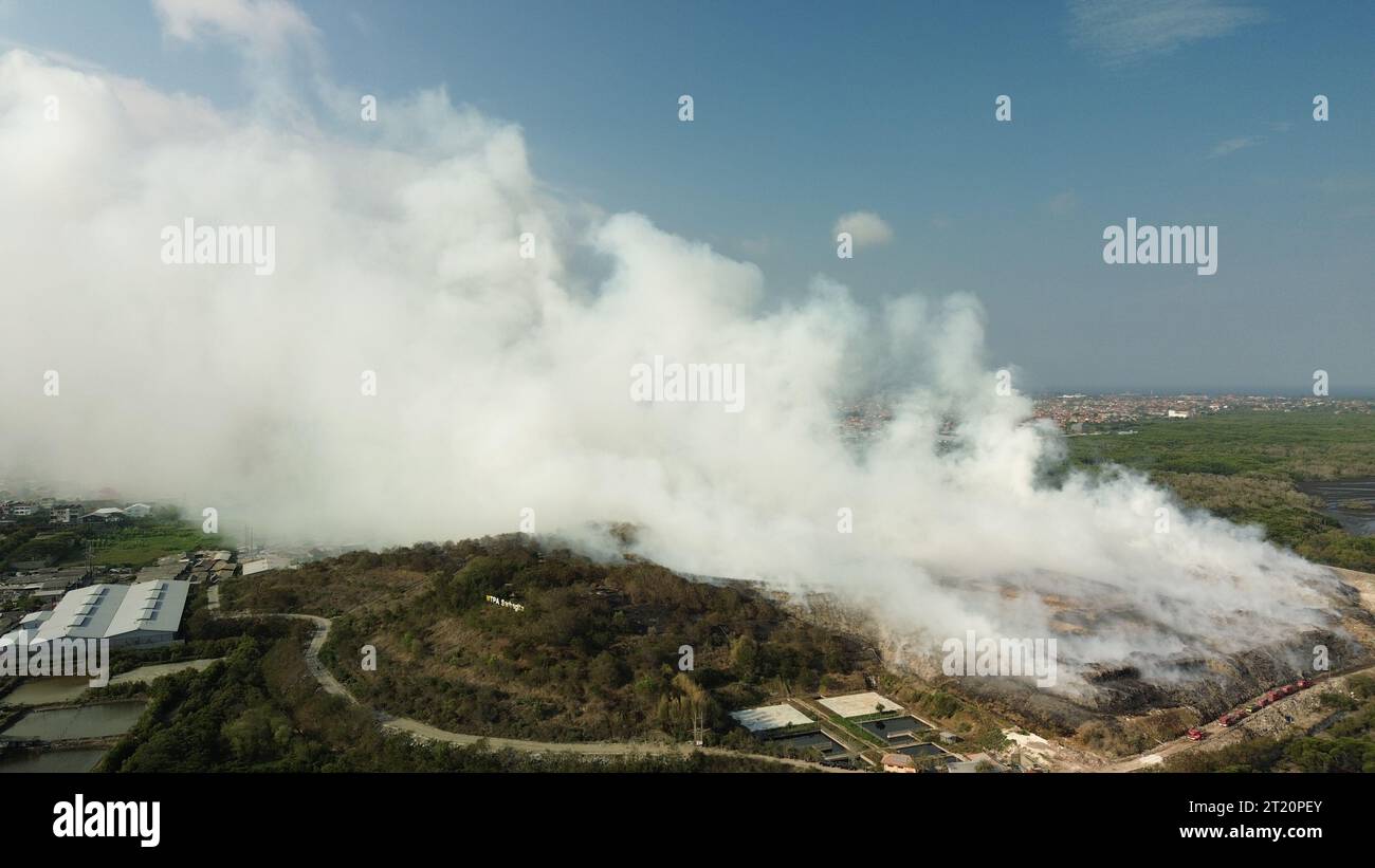 A powerful fire at the largest landfill on the island of Bali. The fire ...