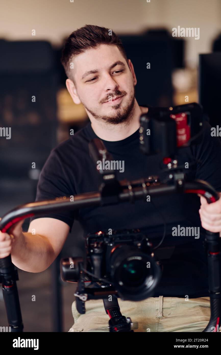 A professional videographer using modern equipment to capture ...