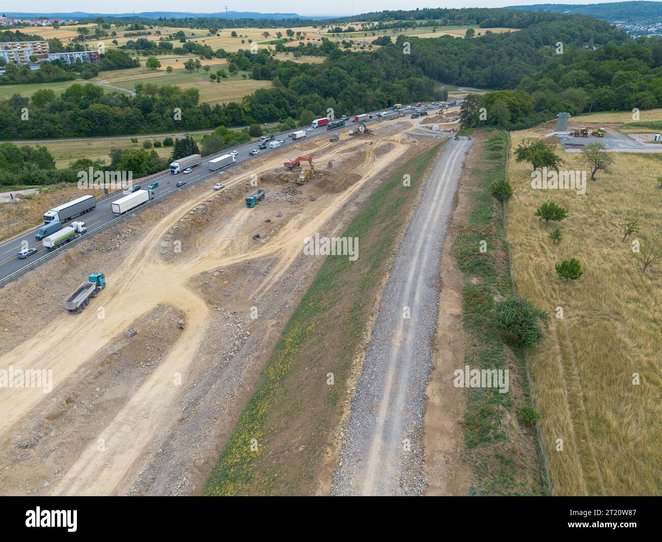 Motorway construction site with construction vehicles and machines, new ...