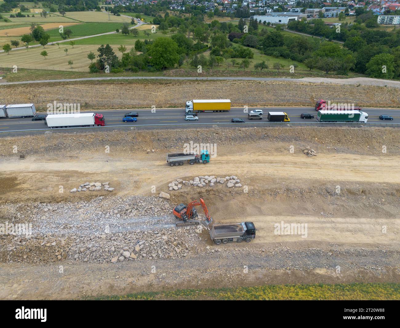 Motorway construction site with construction vehicles and machines, new ...