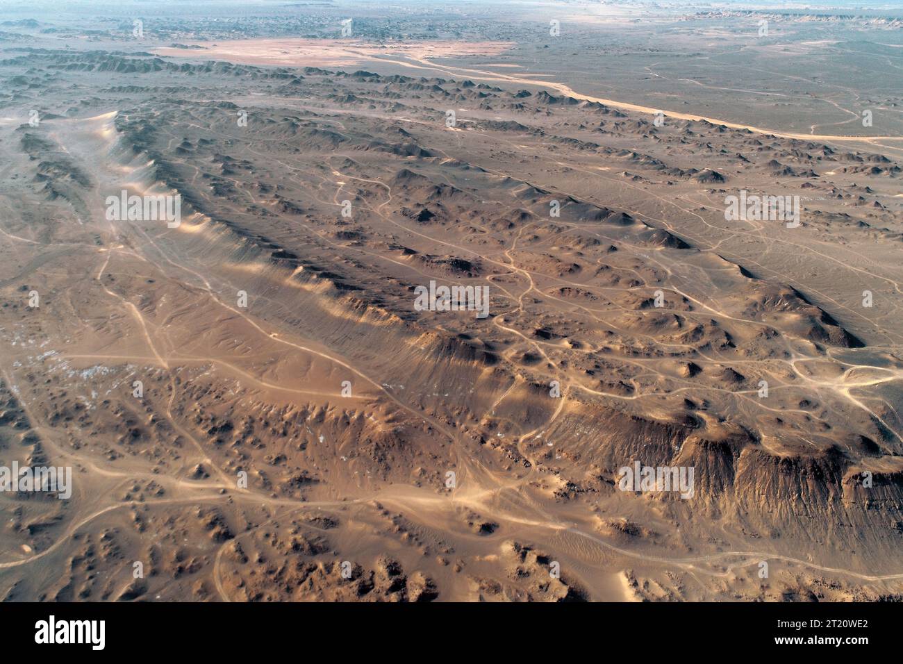 HAMI, CHINA - OCTOBER 15, 2023 - An elliptical crater basin is seen in ...