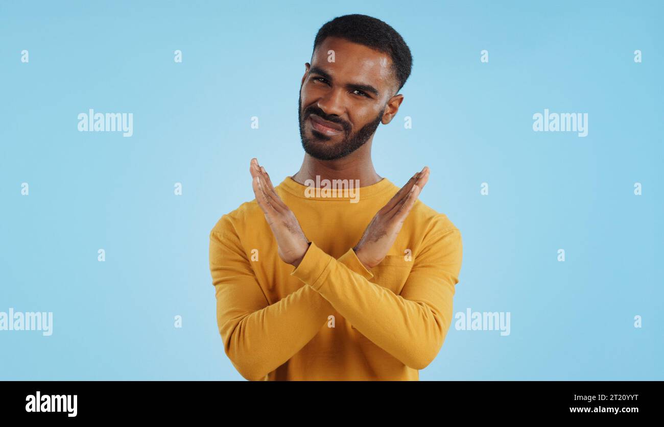 Shaking head, no and face of a man with stop, rejection and ...