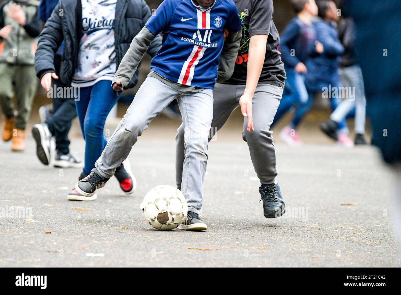 Children playing in an elementary school playground Stock Photo - Alamy