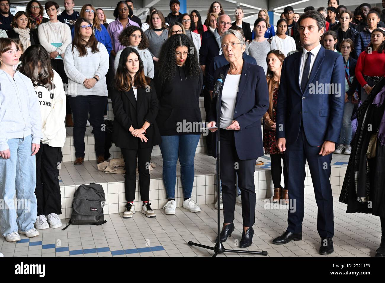 French Prime Minister Elisabeth Borne, center right, speaks before ...