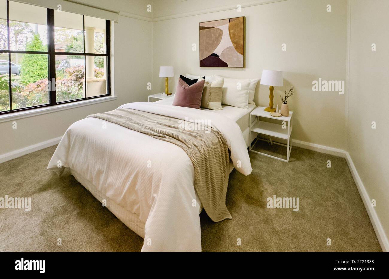 A beautiful cozy bedroom design Stock Photo - Alamy