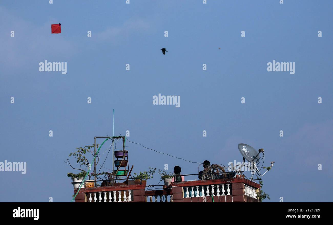 Kathmandu, Bagmati, Nepal. 16th Oct, 2023. Nepali kids fly kites in ...