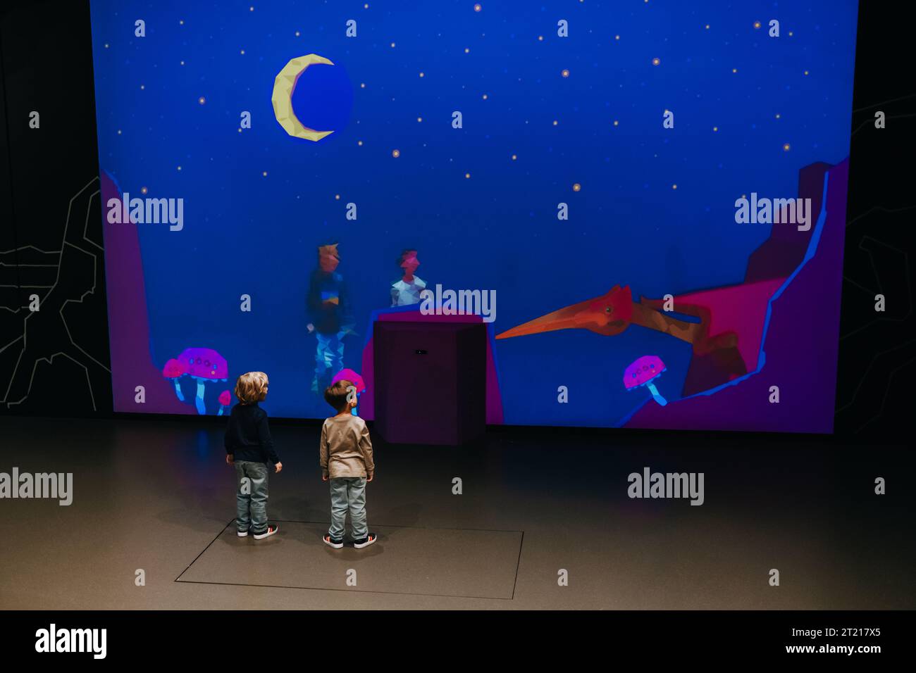 October 2023 - Prague, Czechia. Kids playing interactive screen in ...