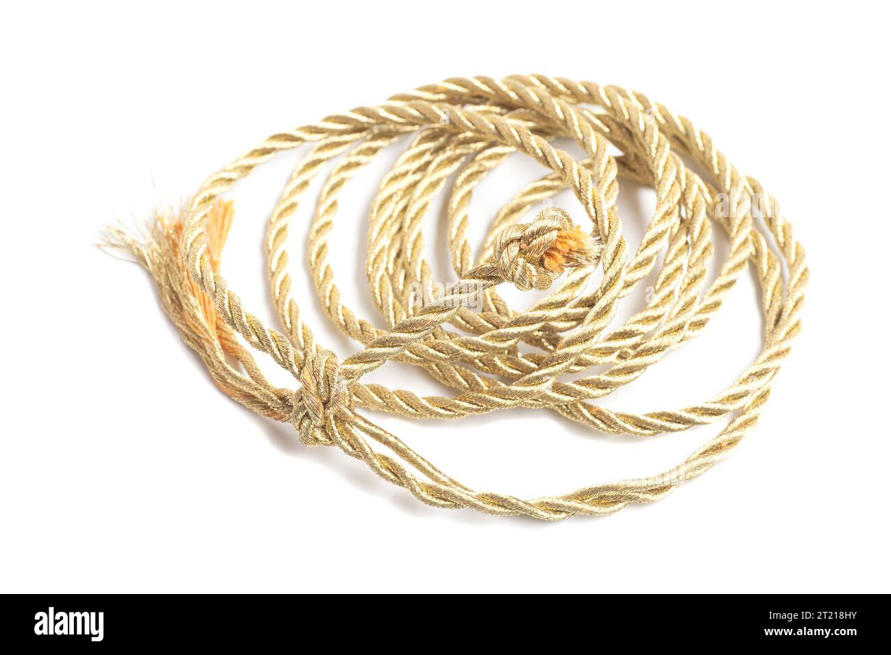 Golden rope isolated on a white background Stock Photo - Alamy