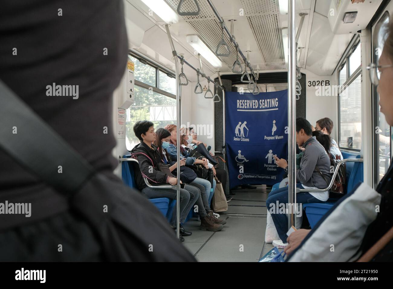Manila, Philippines: Filipino commuters inside the female cabin in an ...
