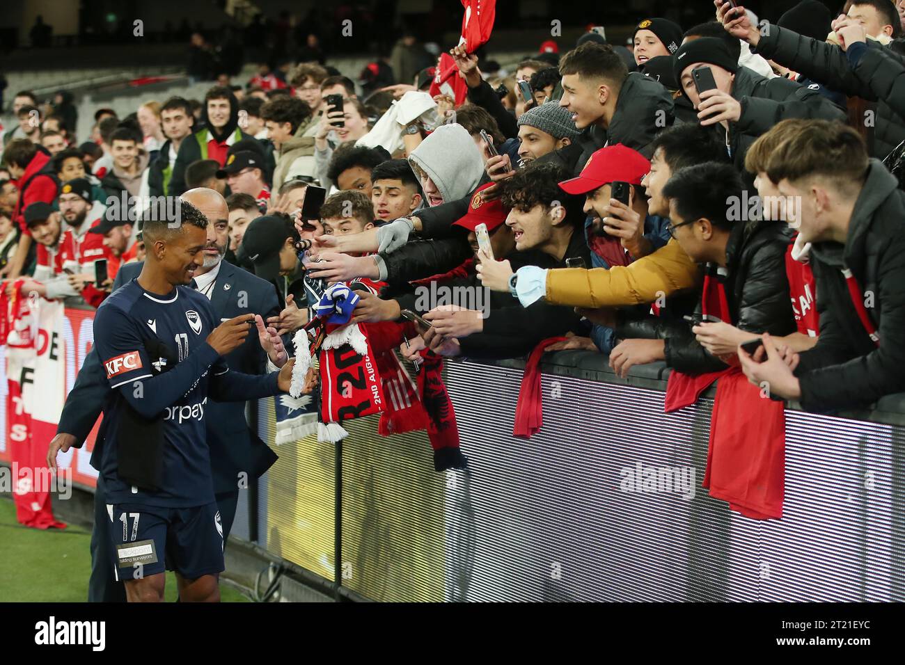 Luis Nani of Melbourne Victory signs autographs for fans of his former ...