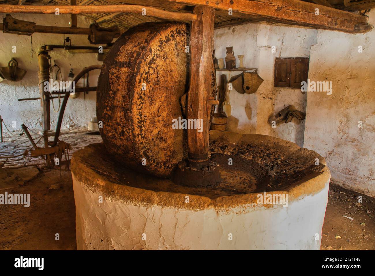 An antique flour mill with a rustic stone exterior Stock Photo - Alamy