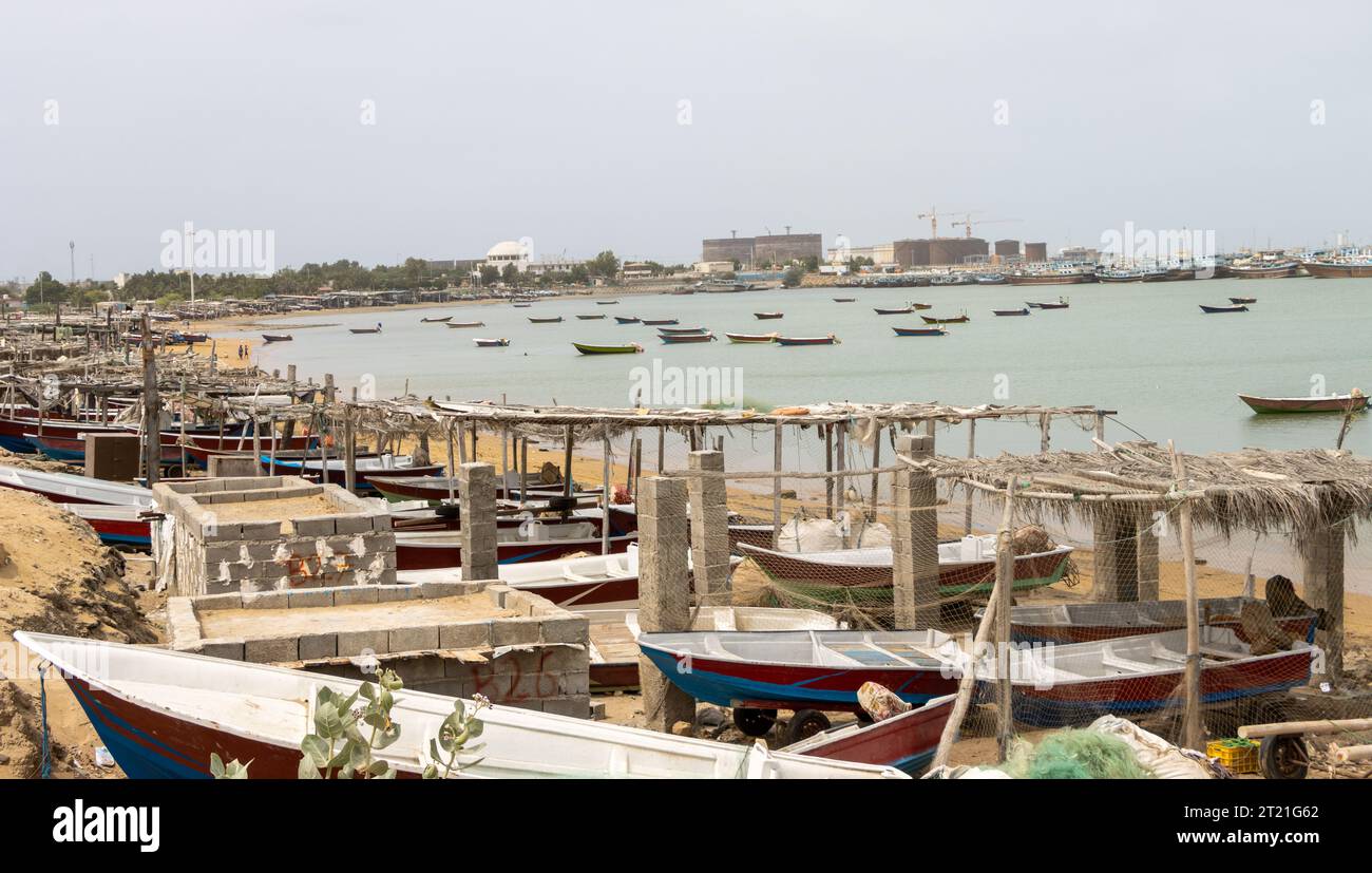 Chabahar, Iran - August 10 2023: Fishing boats on the beach in the port ...